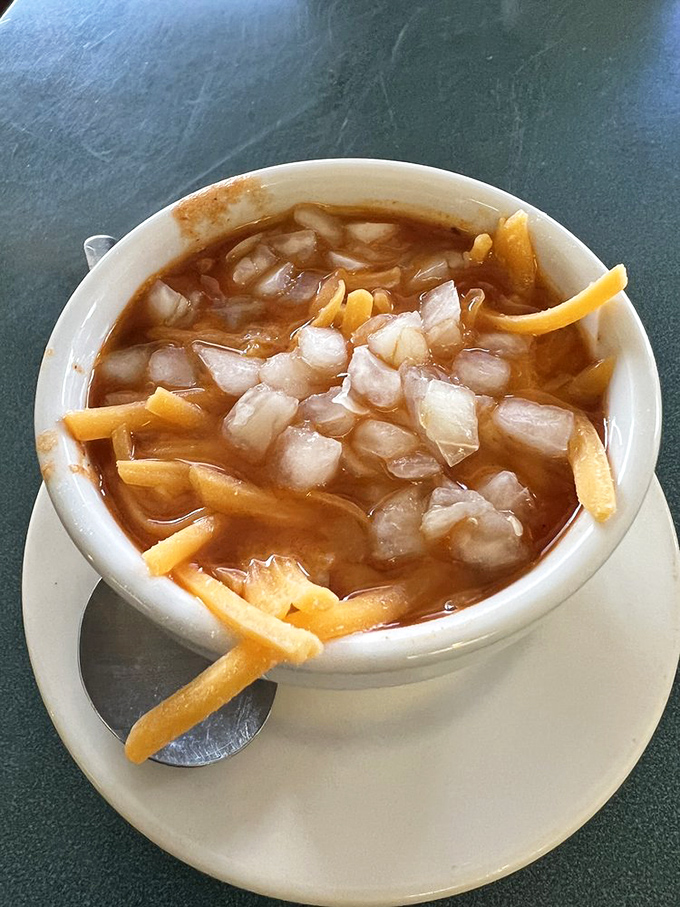 Not just chili, but a warm hug in a bowl. Those French fries aren't lost—they're exploring new flavor territory.