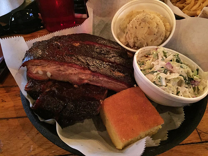 This isn't just a combo plate—it's a United Nations summit where ribs, slaw, and cornbread have gathered to negotiate world peace through deliciousness.