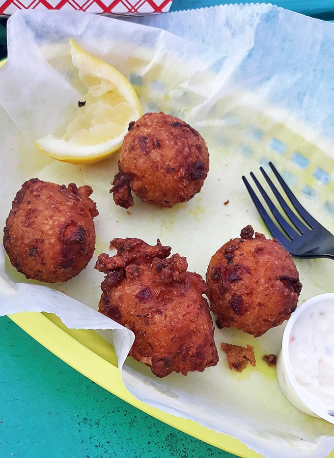 These conch fritters are Florida on a plate – golden-brown, crispy exterior giving way to a tender center that captures the essence of coastal cuisine.