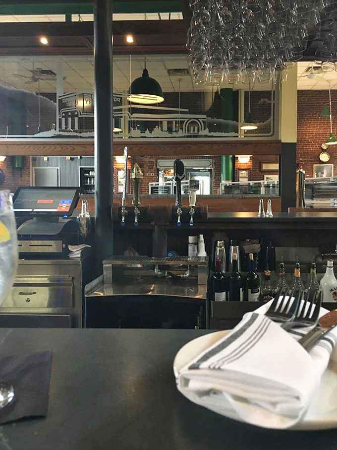 Where culinary magic happens—glimpses of the bar area promise libations worthy of the historic surroundings.