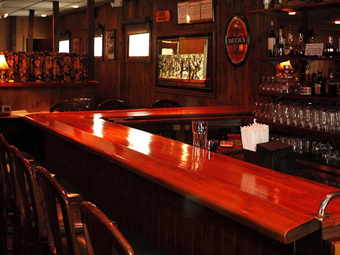 The polished bar counter gleams with possibility – a front-row seat to craftsmanship, whether in cocktails or conversations with fellow diners.