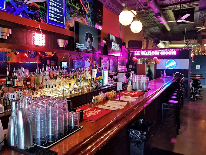 A bar that means business—fully stocked and ready to quench any thirst. The perfect command center for a night of indulgence.