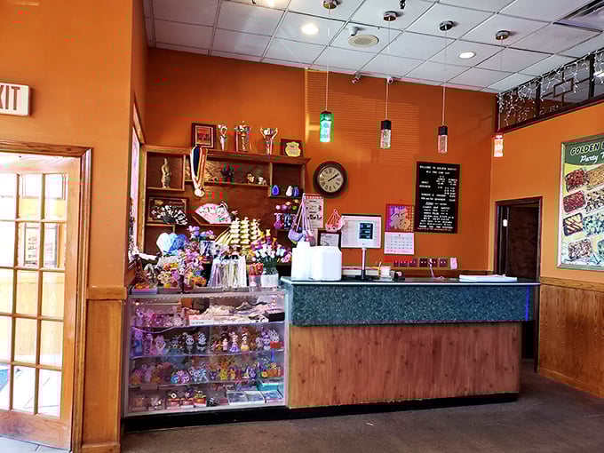 The front counter, where dreams begin and doggie bags are born. Note the candy display—dessert insurance for the road.