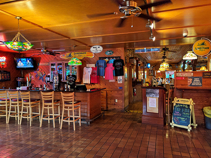 The bar area—where seafood stories grow taller with each round, and strangers become friends over shared crab-cracking techniques.