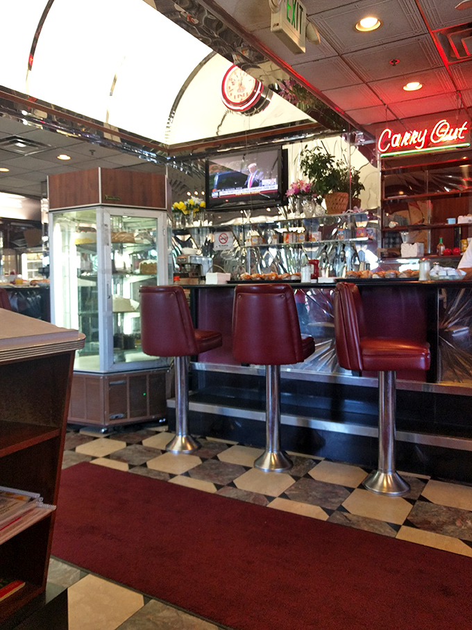 Counter seating for the solo diner—where you're never really alone, just part of the unofficial breakfast club of Double T.