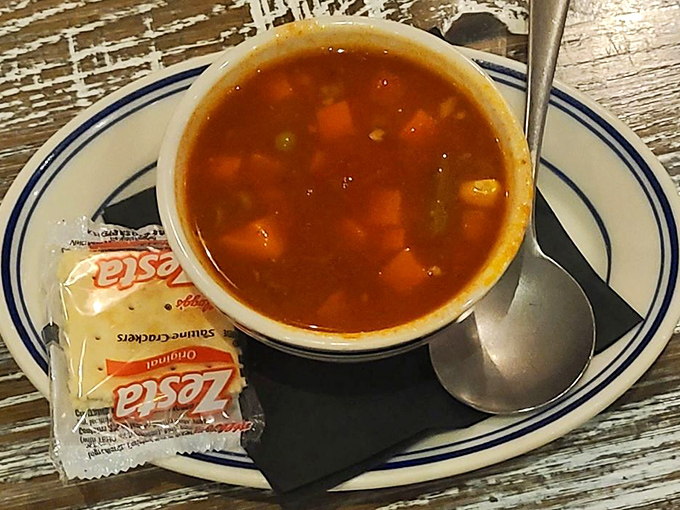 Maryland crab soup: the state's liquid treasure. Each spoonful delivers the essence of the Chesapeake in a steaming, tomato-based embrace.