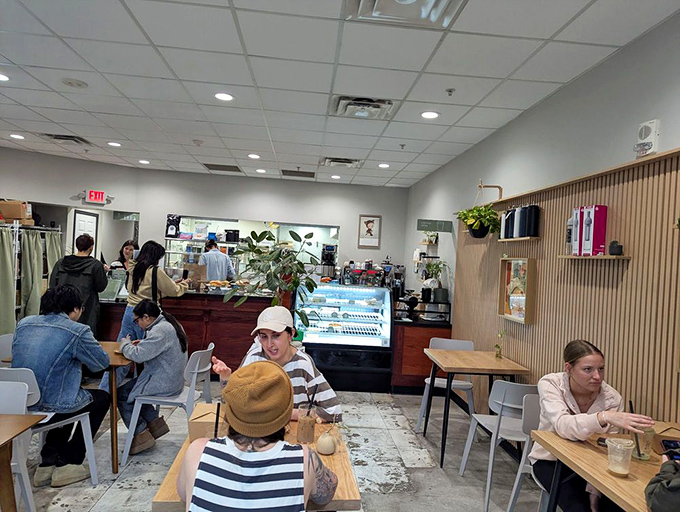 A bakery where people actually look up from their laptops occasionally. The pastries are that good—they demand your full attention.