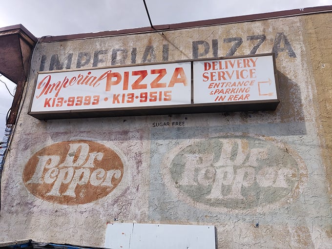 That faded vintage signage with the old phone number speaks volumes—they've been satisfying DelCo appetites since rotary phones were cutting-edge technology.