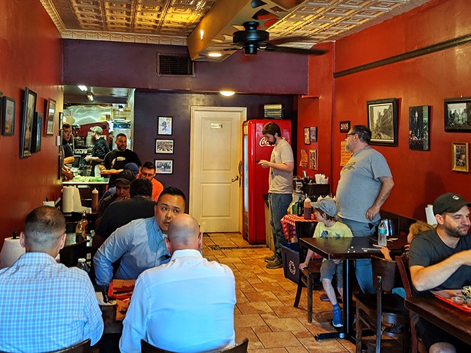 A packed house of happy diners proves the universal truth: good BBQ brings people together better than most family reunions—and with less drama.