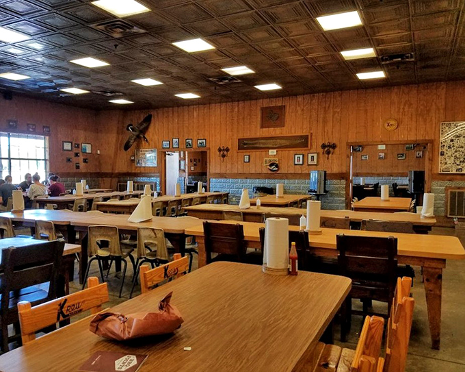 The wood-paneled dining room—where conversations are hushed not out of reverence for the space, but because everyone's too busy chewing to talk.