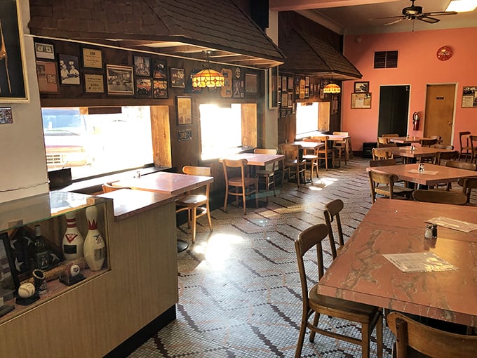 Sunlight streams through windows onto tables that have hosted thousands of satisfied customers—if these chairs could talk!