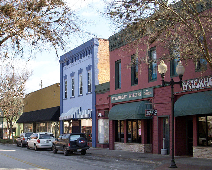 Historic storefronts house local businesses where your dollar supports neighbors, not corporate shareholders with yachts bigger than your house.