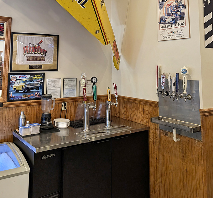 The draft beer station stands ready for action—where your glass will soon be filled with something cold to wash down that legendary meatball sub.