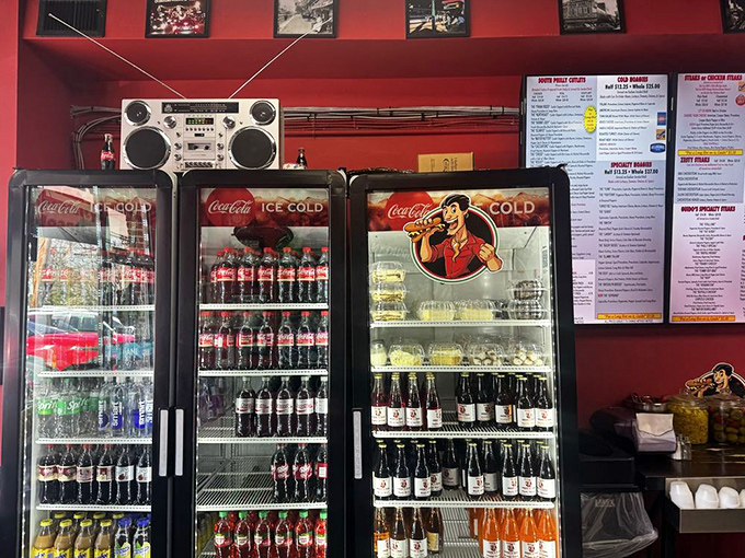 Cold beverages standing at attention in the cooler – because every great sandwich needs its liquid companion.