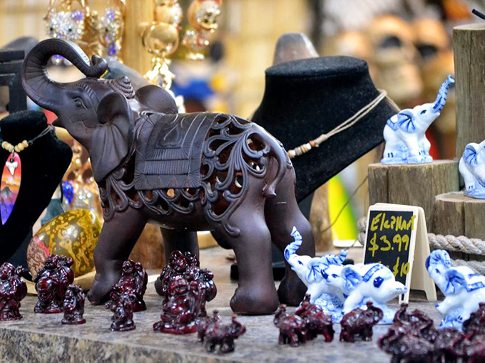 These carved elephants carry more than decorative detail—they transport a piece of global craftsmanship directly to Florida living rooms.