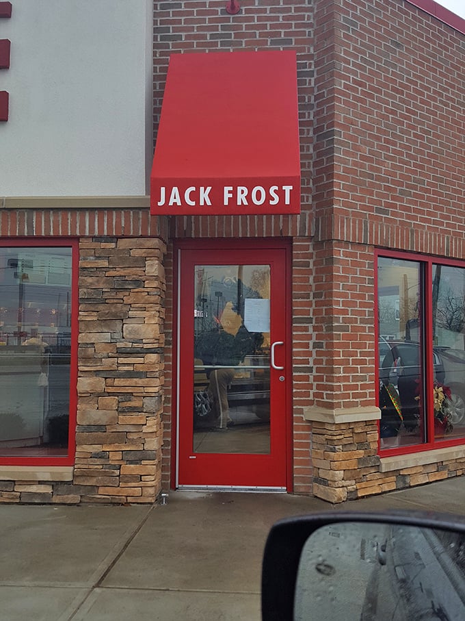The red door beckons like a portal to a parallel universe where calories don't count and sugar is a food group.
