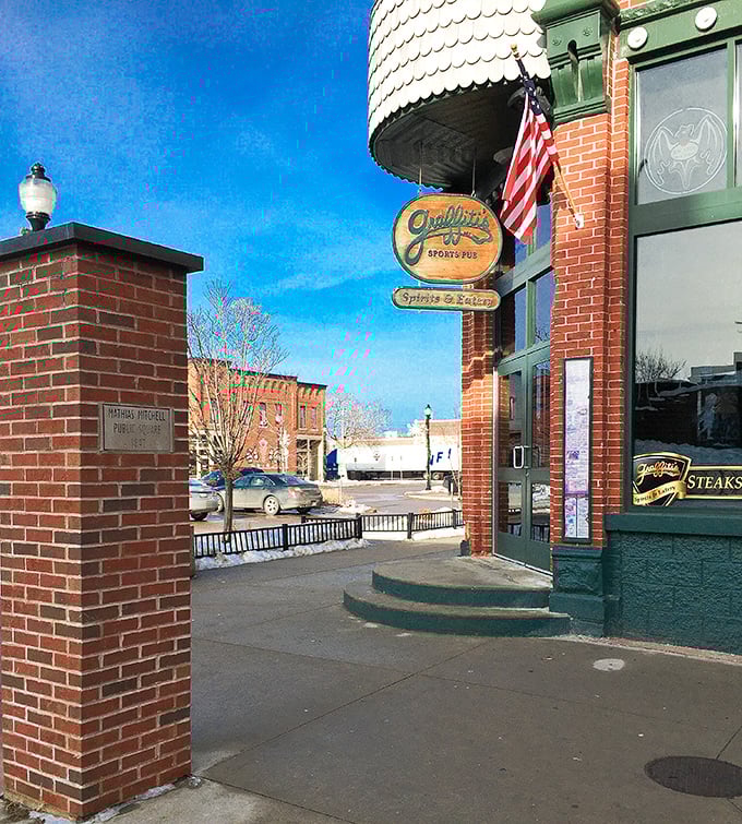 The entrance sign promising "Spirits & Eats"—two simple words that somehow perfectly capture everything wonderful about this Stevens Point institution.