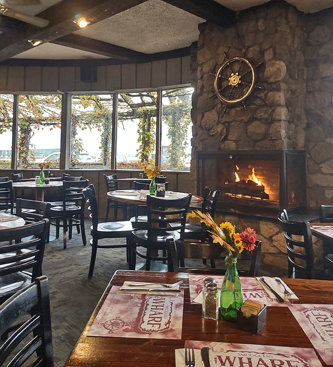 Nothing says "treat yourself" like seafood by firelight—this stone hearth keeps Erie winters at bay while you dive into ocean treasures.