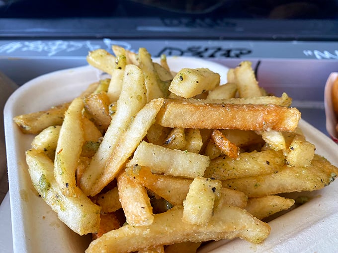 These aren't just fries—they're garlic-kissed potato wands that make you wonder why you'd ever eat them any other way.