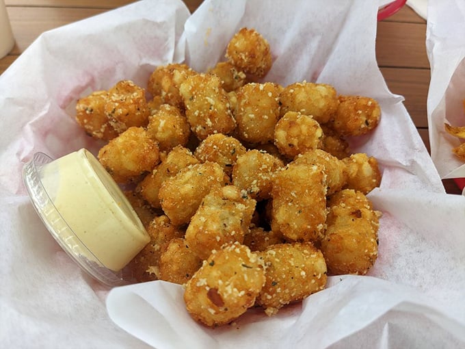 These golden-fried garlic tots are like the supporting actor who steals the show—crispy, punchy little flavor bombs that deserve their own fan club.