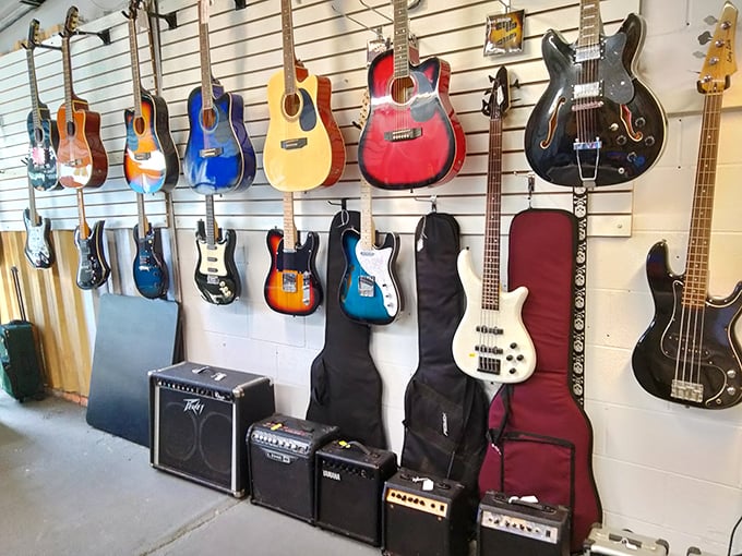 A wall of musical possibility where future rock stars and weekend warriors alike find their next six-string companion at prices that won't break the band.