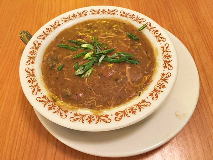This isn't just soup—it's a bowl of Louisiana soul topped with scallions. Comfort food that transcends geographical boundaries.