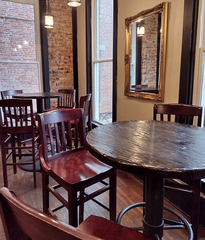 These tables have witnessed countless toasts, confessions, and desserts split "just to taste." The mirror reflects more than diners—it captures moments.