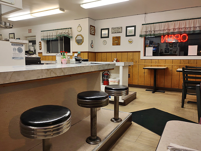 Another angle of diner perfection—where every stool has witnessed countless cups of coffee and life stories shared over eggs.