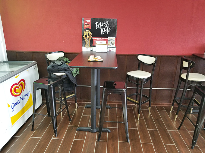 High-top tables invite quick, focused dining. This isn't a place for lingering—it's for serious sandwich business with occasional moments of bliss.