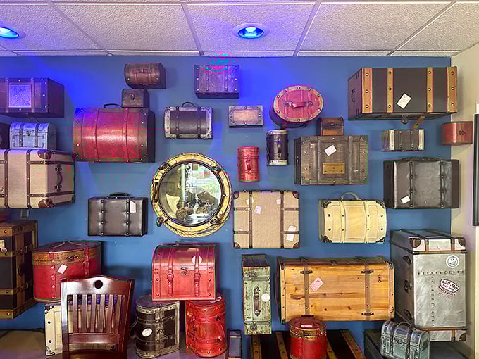 A wall of vintage luggage and trunks that tells seafaring tales without saying a word—the Instagram backdrop of your dreams.