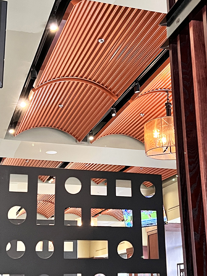 Those copper ceilings aren't just gorgeous—they're conversation starters. Architectural details that make you look up from your food (briefly).
