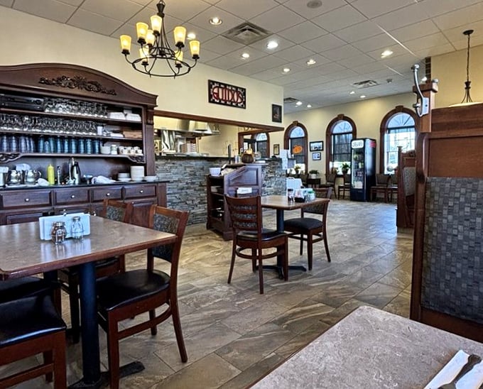 Warm wood tones, stone accents, and that chandelier – Guido's dining room feels like the Italian restaurant set designers create when they want to evoke "authentic charm."