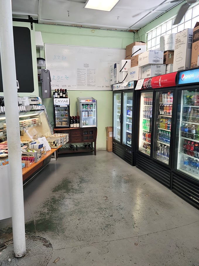 The market side reveals the operation's true colors—a serious seafood business where beverages and snacks stand ready for the journey home.