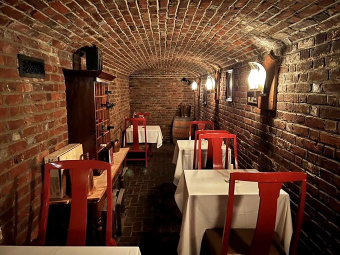 The brick cellar dining room feels like discovering a secret speakeasy from America's storied past.