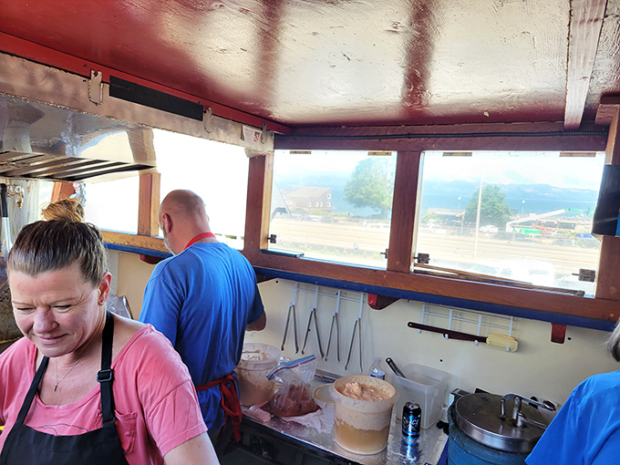 Inside the boat's belly, culinary magic happens daily – this is where dreams get their golden coating.