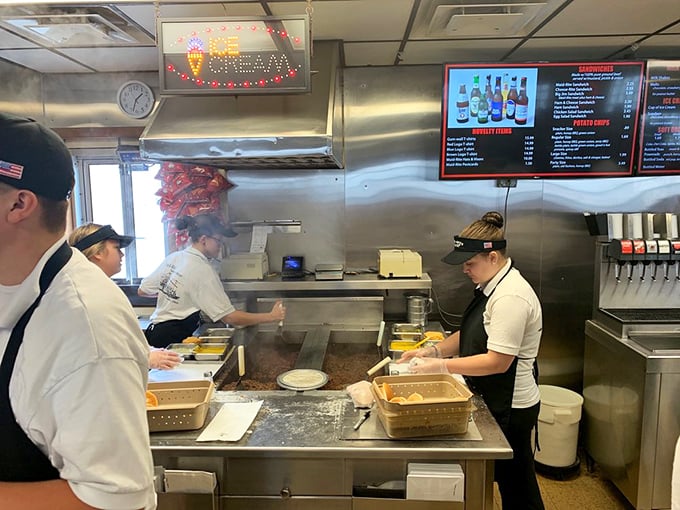 Sandwich artisans at work! The kitchen crew maintains the time-honored traditions that keep loyal customers coming back decade after decade.
