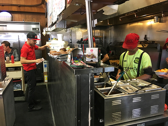 The kitchen crew moves with the choreographed precision of people who've turned breakfast into both science and art.