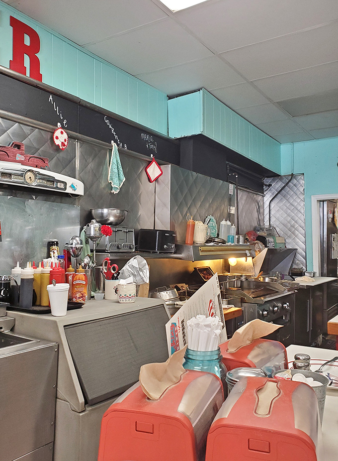 No fancy kitchen stadium here—just hardworking equipment and the organized chaos that somehow produces plate after plate of breakfast perfection.