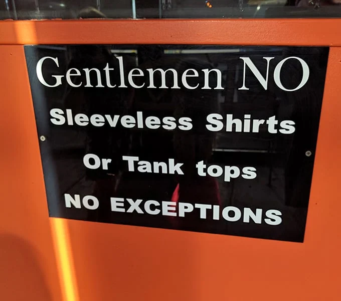 Old-school rules still apply—no tank tops allowed. Some traditions, like proper attire and perfect pizza, never go out of style.