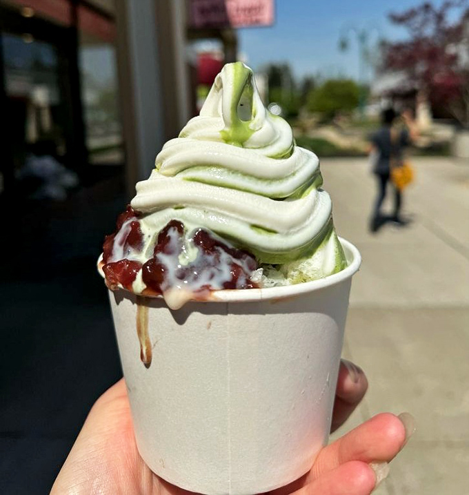 Matcha soft serve swirled to towering heights—the Everest of ice cream with a red bean base camp. Climb it with your spoon.