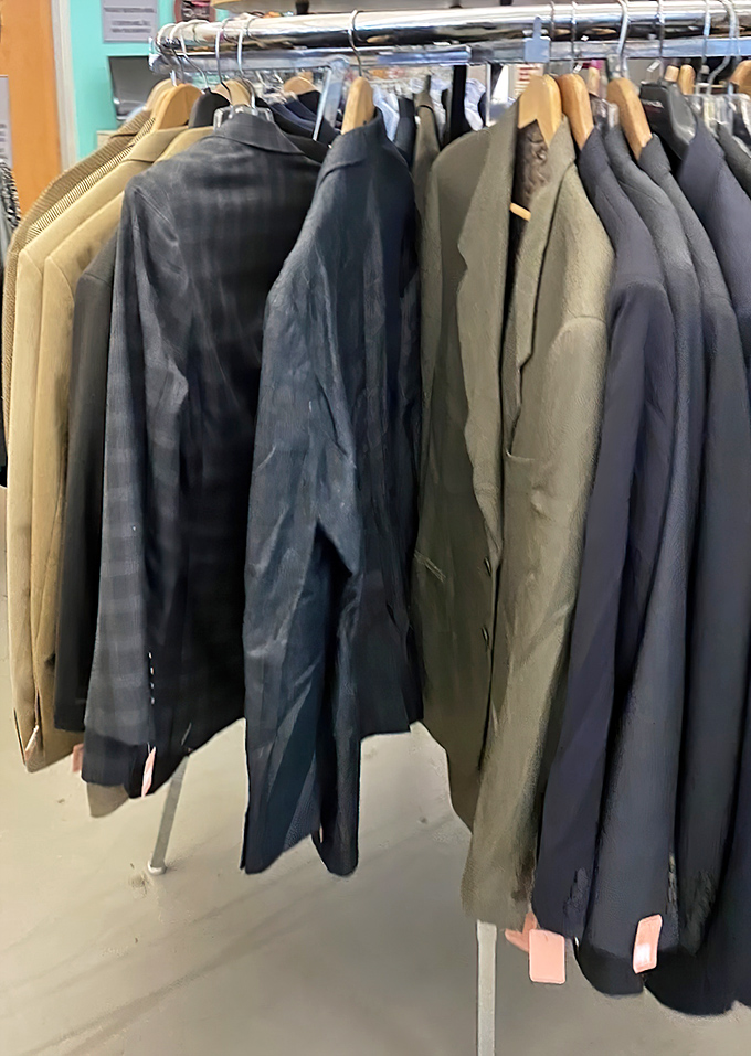 Men's blazers and sport coats hang with dignity, waiting for their second act. That olive green number could take someone from job interview to dinner date.