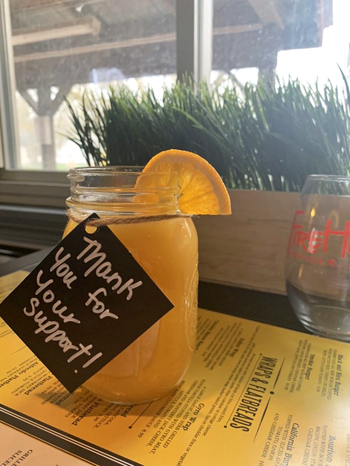 Sunshine in a mason jar with a grateful tag—this isn't just a drink, it's liquid optimism with a citrus twist.