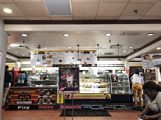 The order counter where dreams become reality and hunger transforms into pure, unadulterated satisfaction ahead.