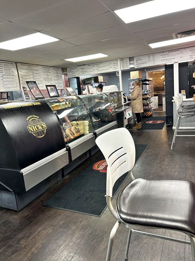Where sandwich magic happens. The deli counter—part workspace, part theater stage—where ordinary ingredients transform into extraordinary meals.