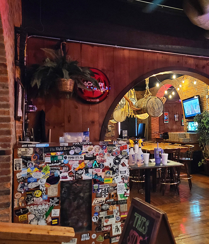 The order counter, adorned with years of stickers and character, stands as the gateway between hunger and happiness at Hounddog's.
