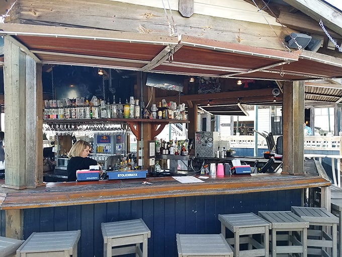 The outdoor bar captures that laid-back coastal vibe where time slows down and the only urgent decision is which cocktail to try next.
