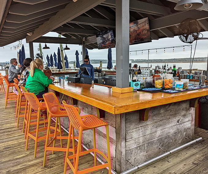 The outdoor bar where sunset views come standard with every order – no extra charge.