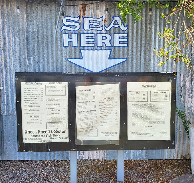 "SEA HERE" indeed. The outdoor menu board makes a promise that the kitchen keeps—ocean-worthy fare in the heart of the desert.