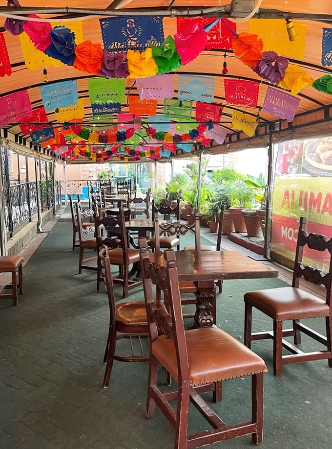 Dining under a canopy of colorful papel picado feels like eating inside a perpetual fiesta—no special occasion required.