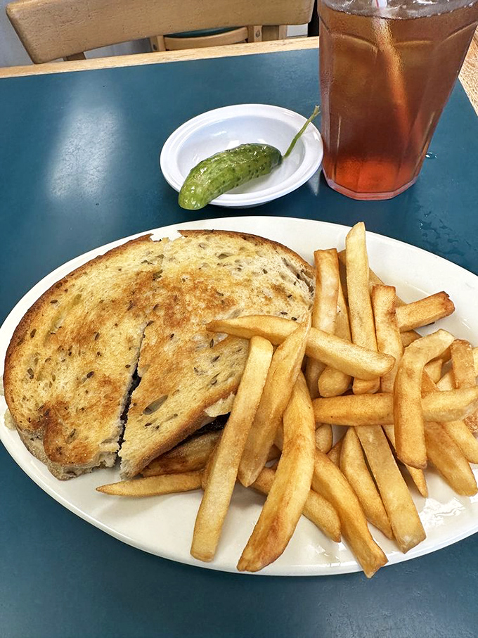 The patty melt – that glorious intersection of burger and grilled cheese. Those fries look like they've been double-fried to achieve optimal crunch.